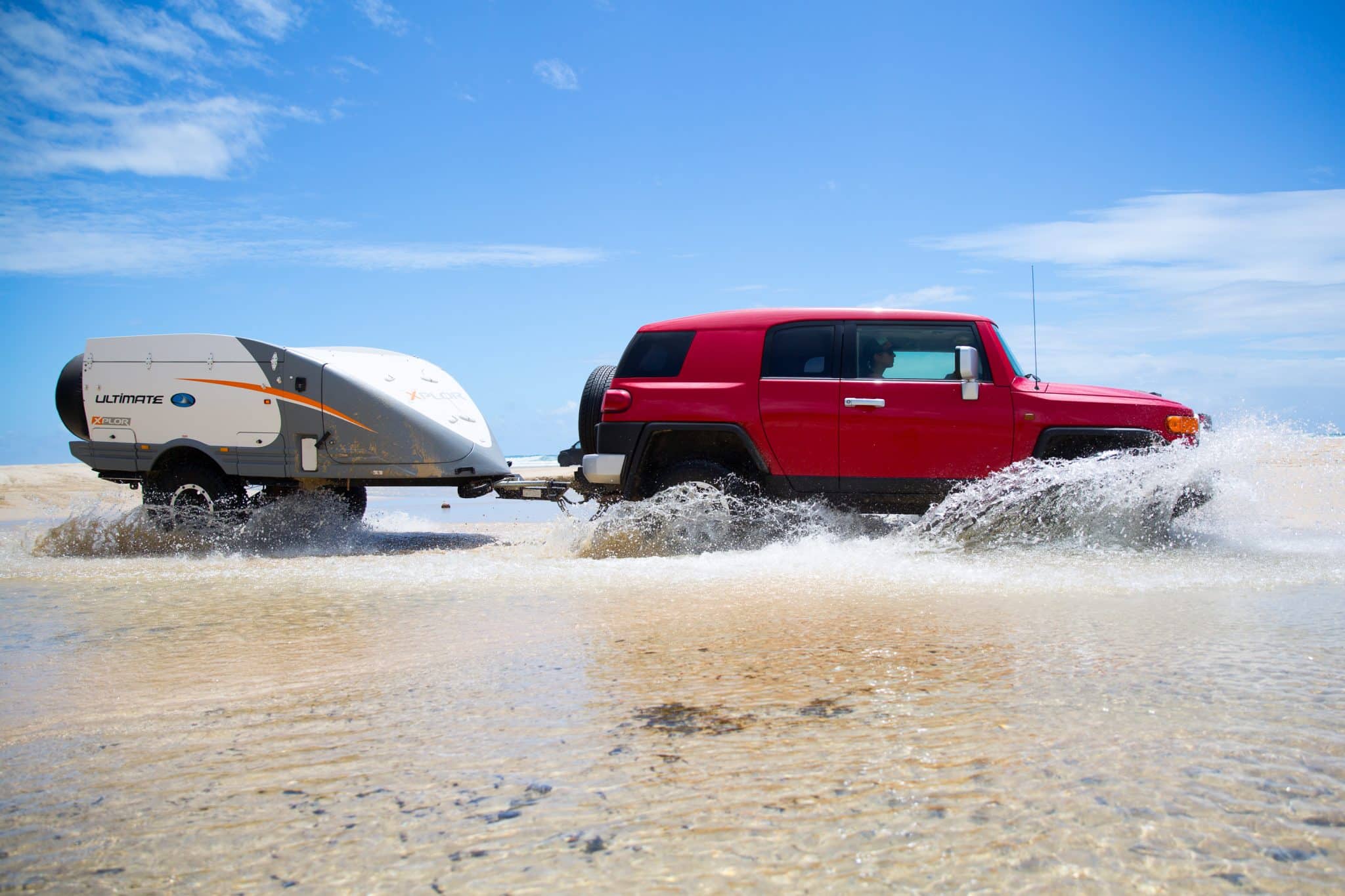 How to take your little house for a swim: towing through water
