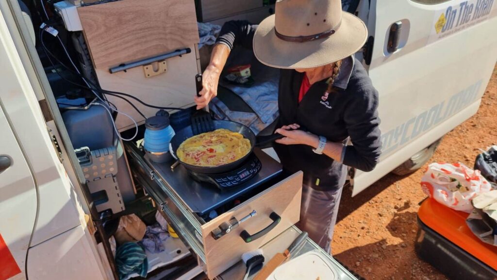 Is 240V cooking a viable option for long-term travel in an RV?