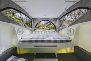 This slide on camper is not only lightweight, but also has an ensuite